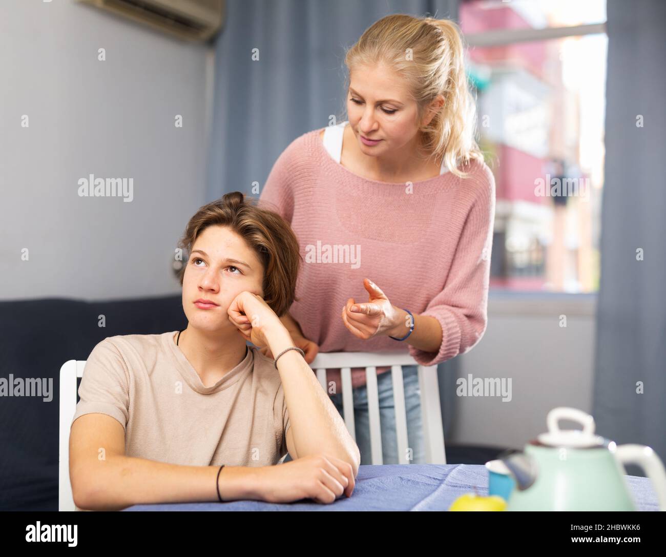 Troubled teen boy mother hi-res stock photography and images - Alamy