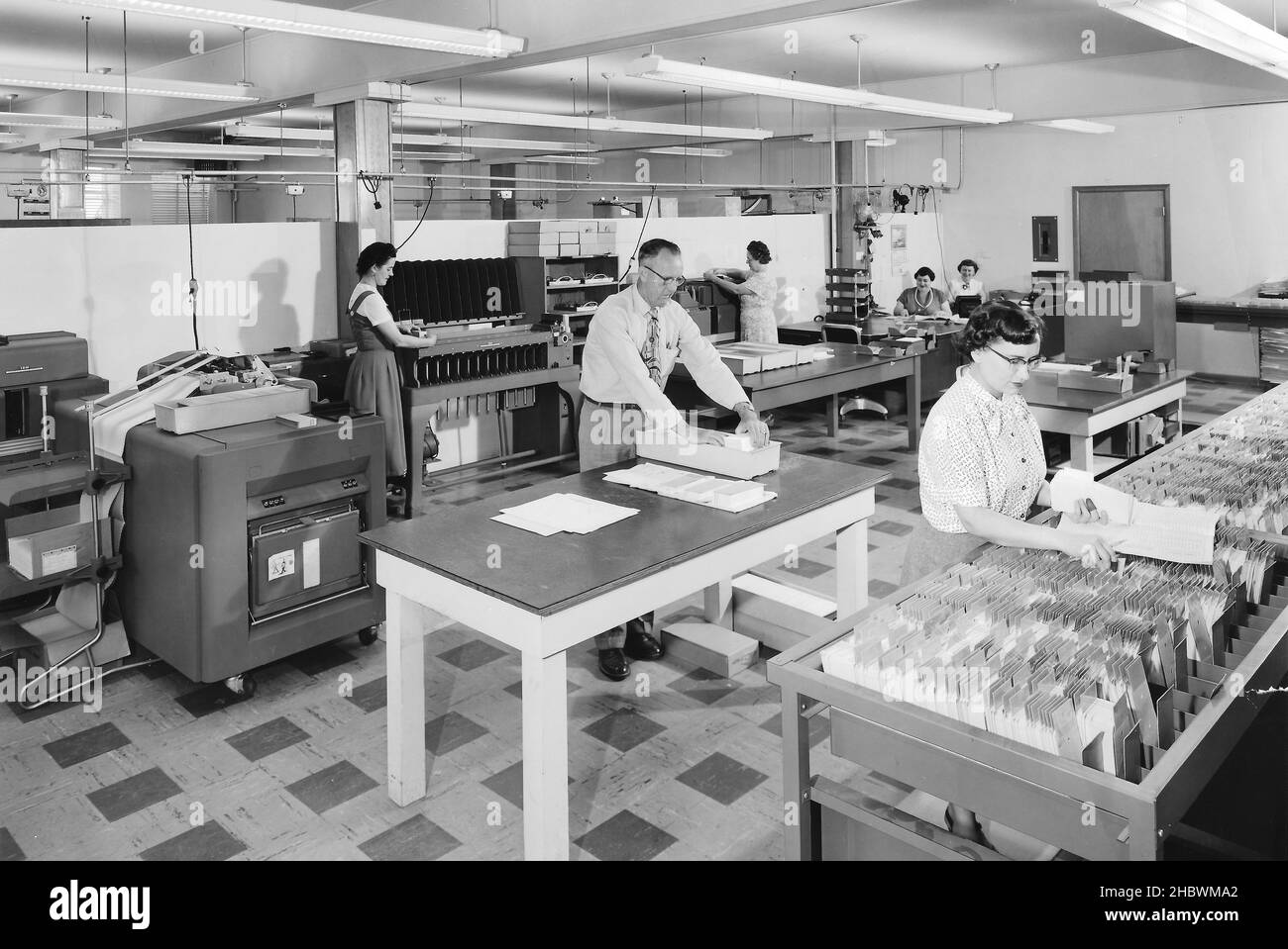 Punched Card Collating and Printing Machine operation with operators ...