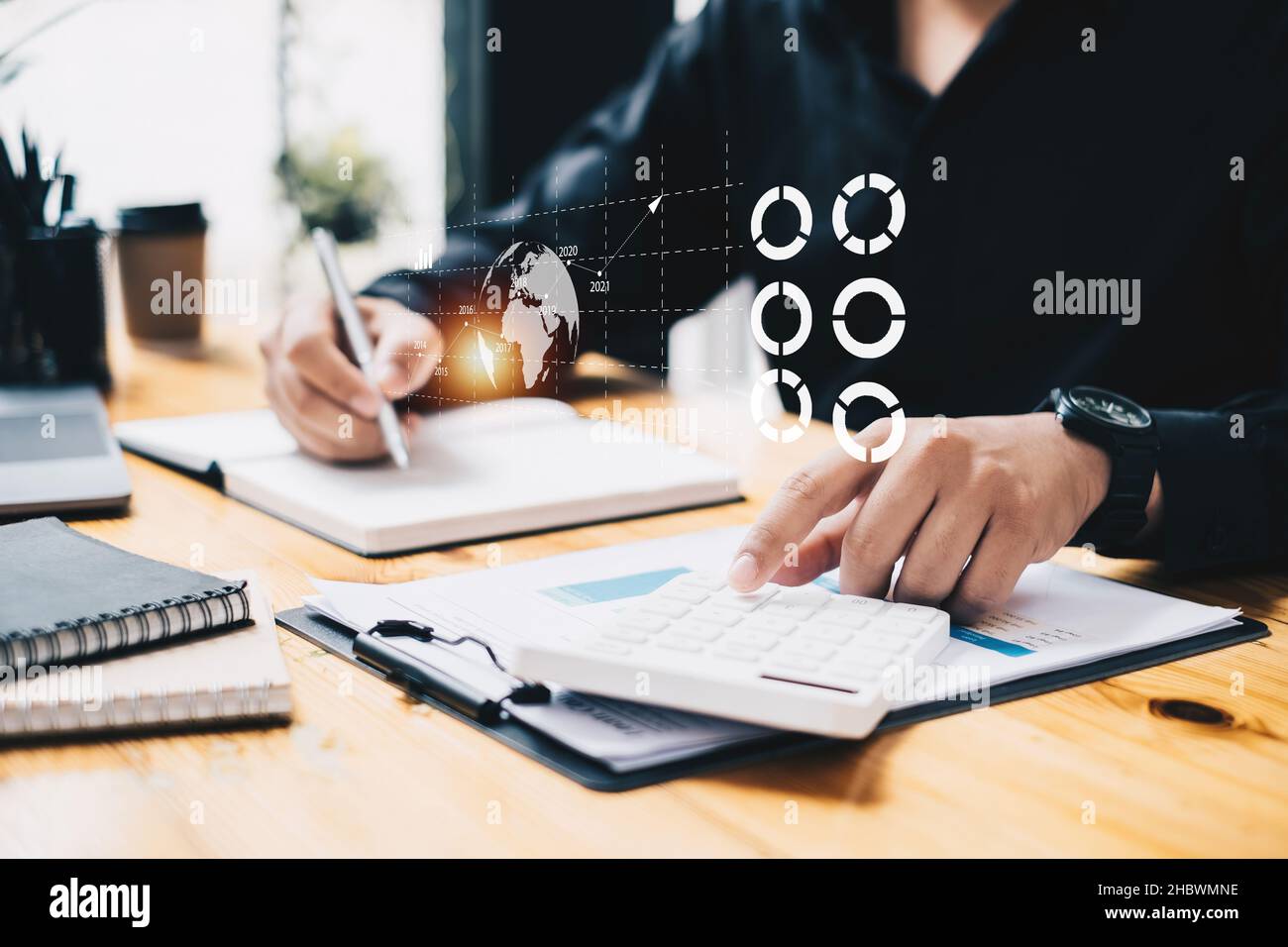 Businessman working to analyze technical price graph and indicator ...