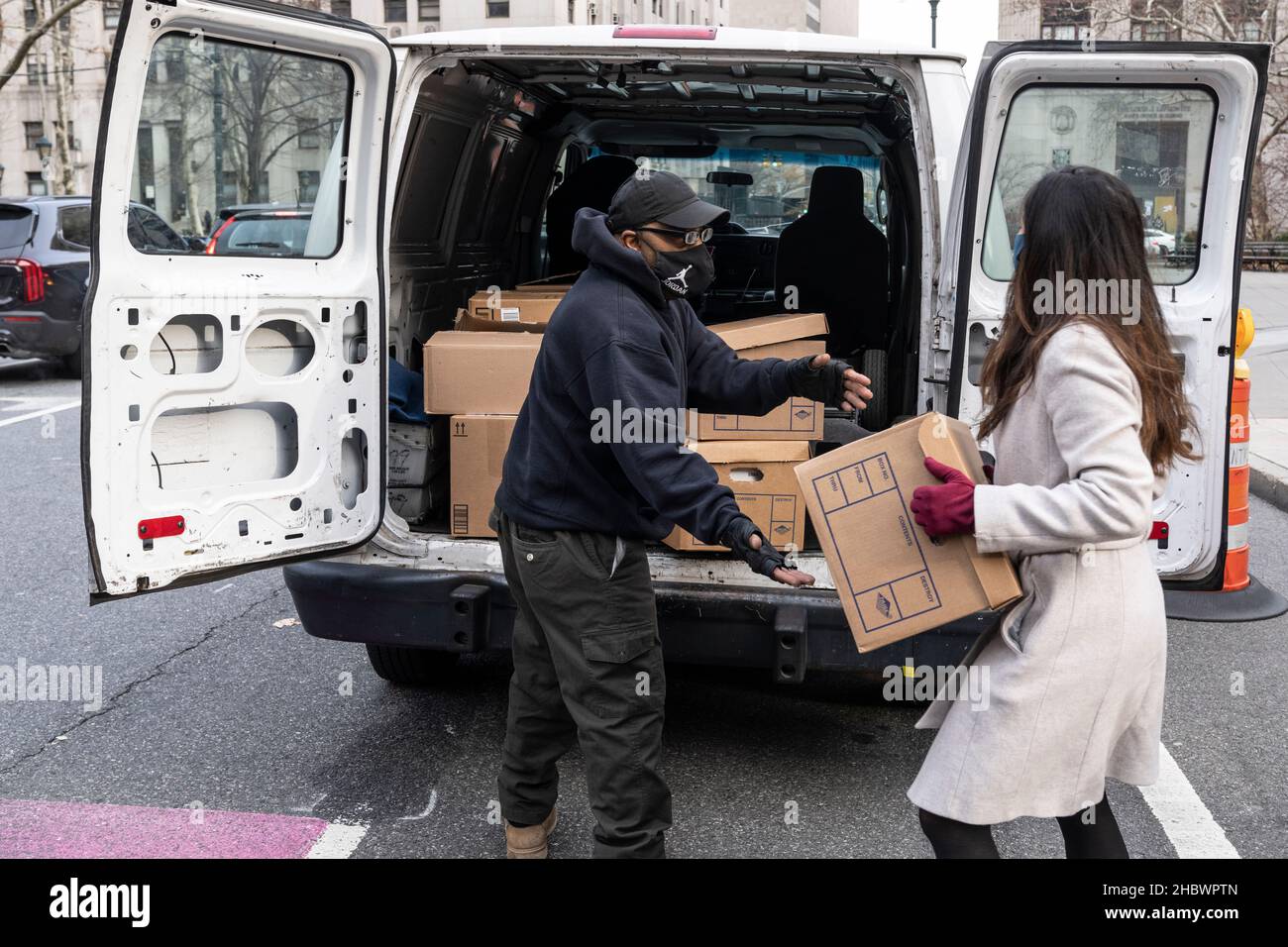 New York, NY - december 21, 2021: Assistants of Christian Everdell ...