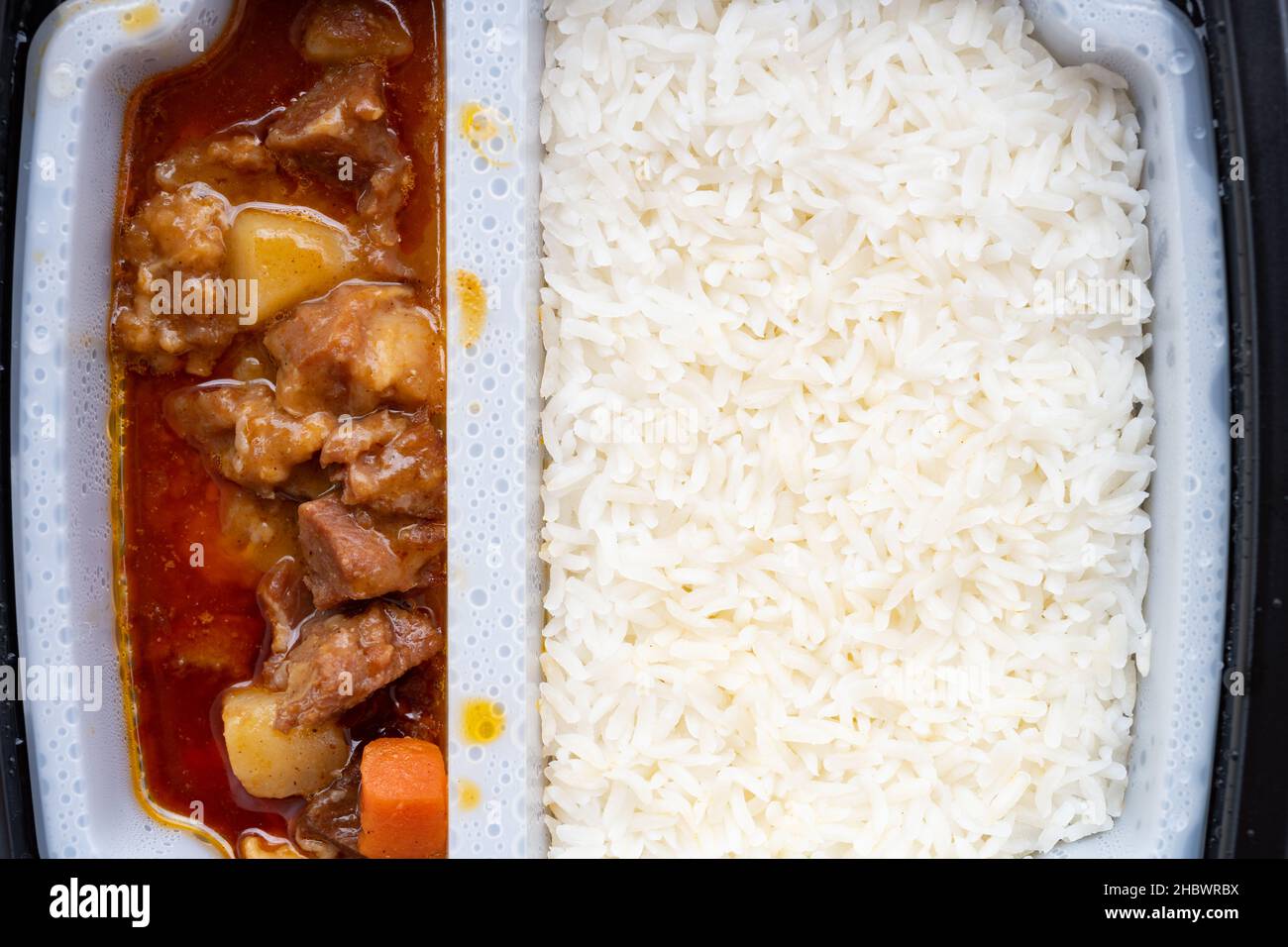 top view fresh self cooking fast food of beef with potato and rice ...