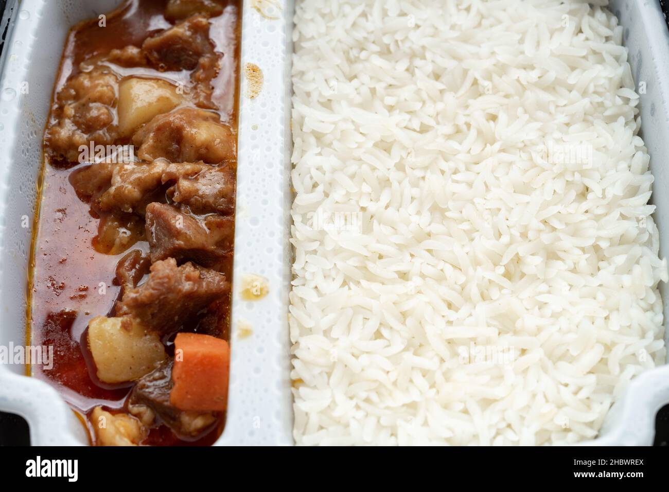 angle view fresh self cooking fast food of beef with potato and rice ...