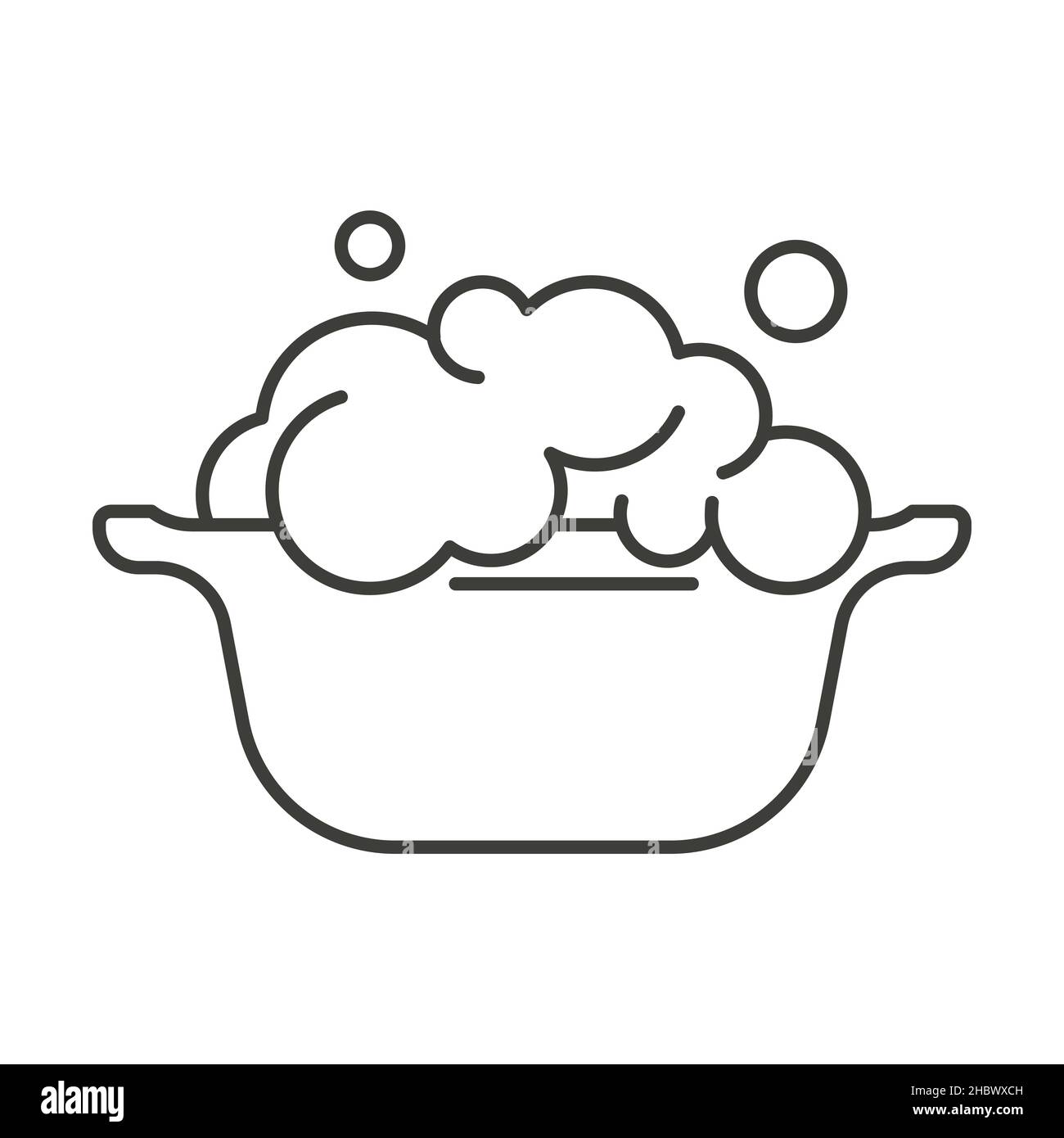 A basin with a soapy solution for washing clothes. Vector outline ...