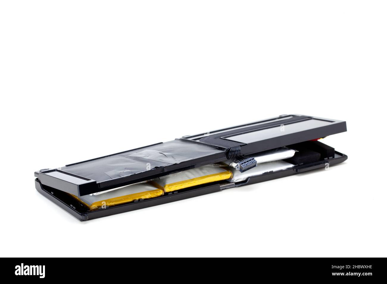 damaged swollen Lithium polymer, Li-ion batteries for laptop isolated ...