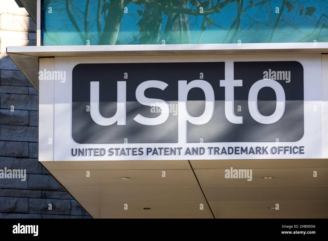 USPTO sign on the facade of United States Patent and Trademark Office ...
