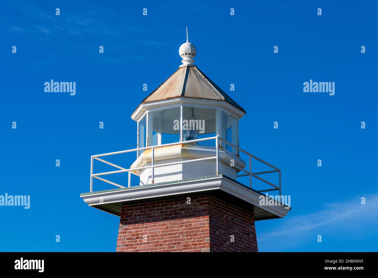 Watch room of a vintage four sided lighthouse. The concrete building is ...