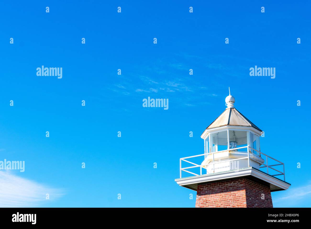Watch room of a vintage four sided lighthouse. The concrete building is ...