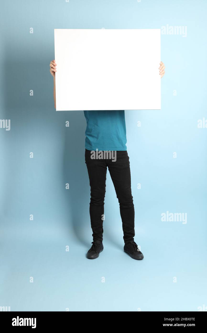 The senior Asian man on the blue background Stock Photo - Alamy