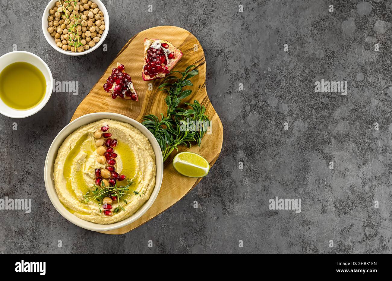 Lebanese Hummus, mashed chickpeas with pomegranate, lime, spices, olive ...