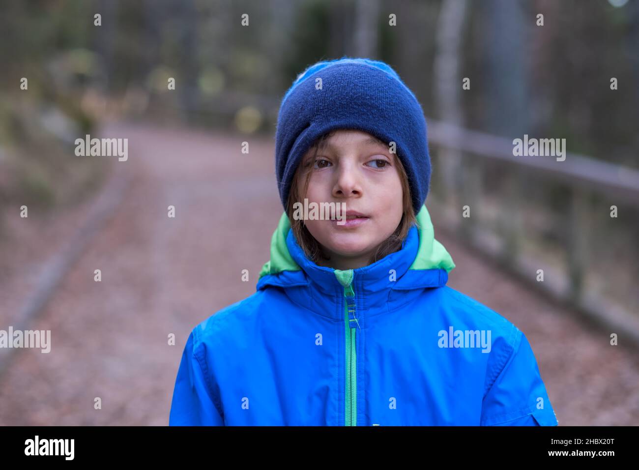 Kid in blue Stock Photo - Alamy