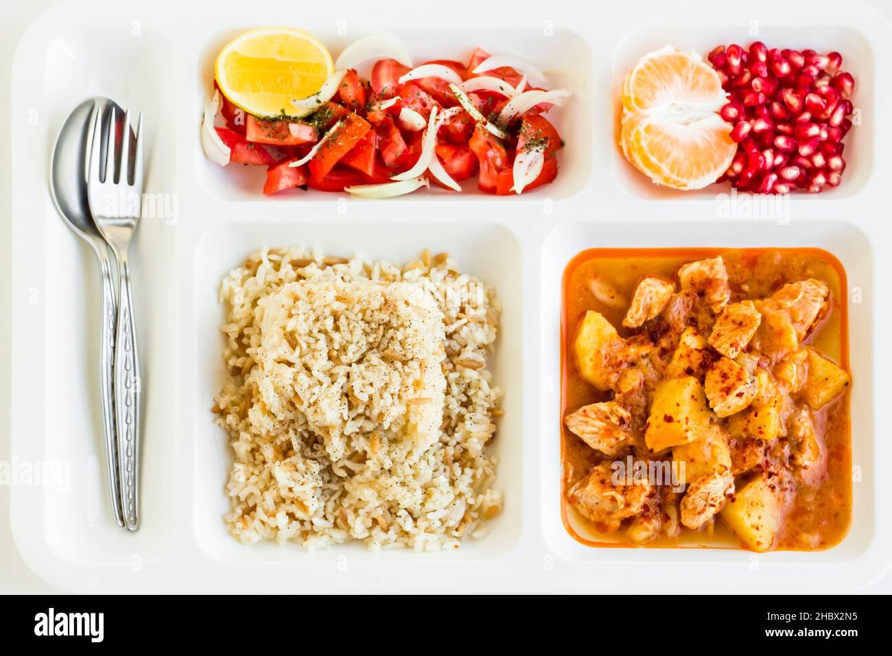 Traditional Turkish Meal with chicken potato,rice,tomato salad and ...