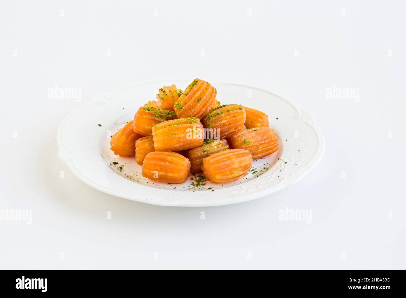Traditional Turkish Crispy,Pastry Dessert Tulumba in plate on white ...