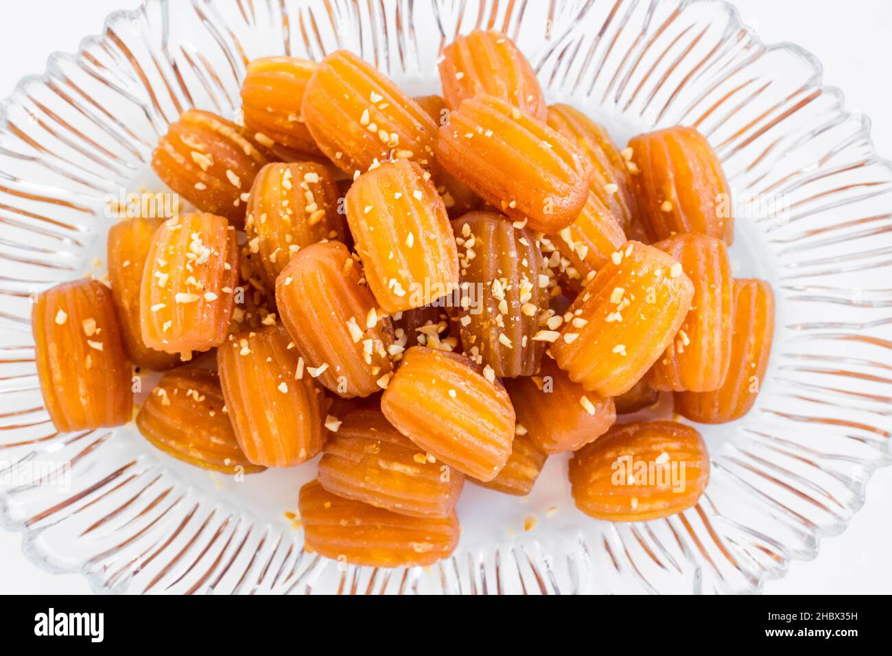 Traditional Turkish Pastry Dessert Tulumba,heap in the oval glass plate ...