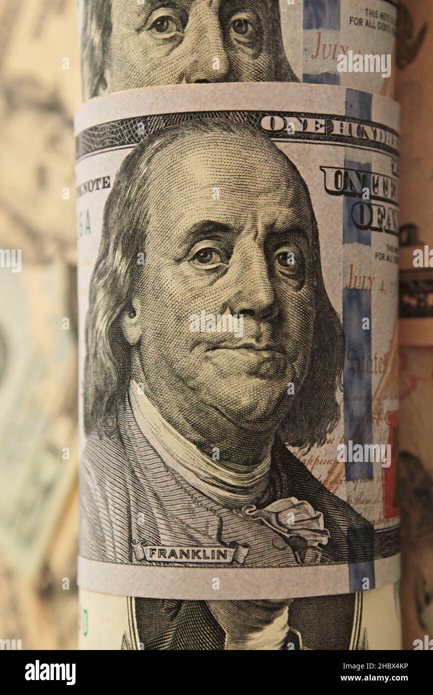 American Hundred Dollar Banknote,rolled up,close up taken of face Stock ...