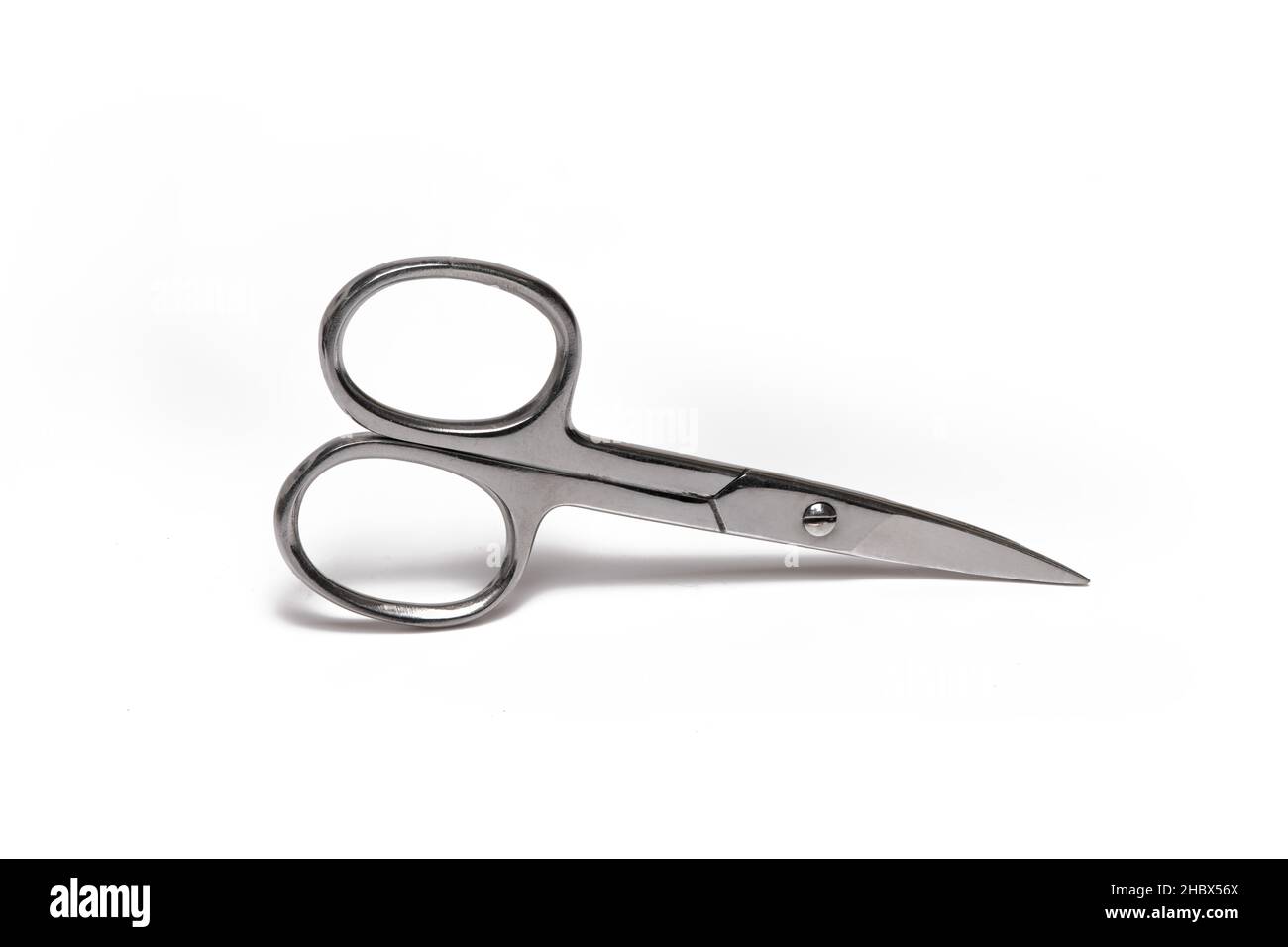 a pointed sharp chrome nail scissors for shortening fingernails and ...
