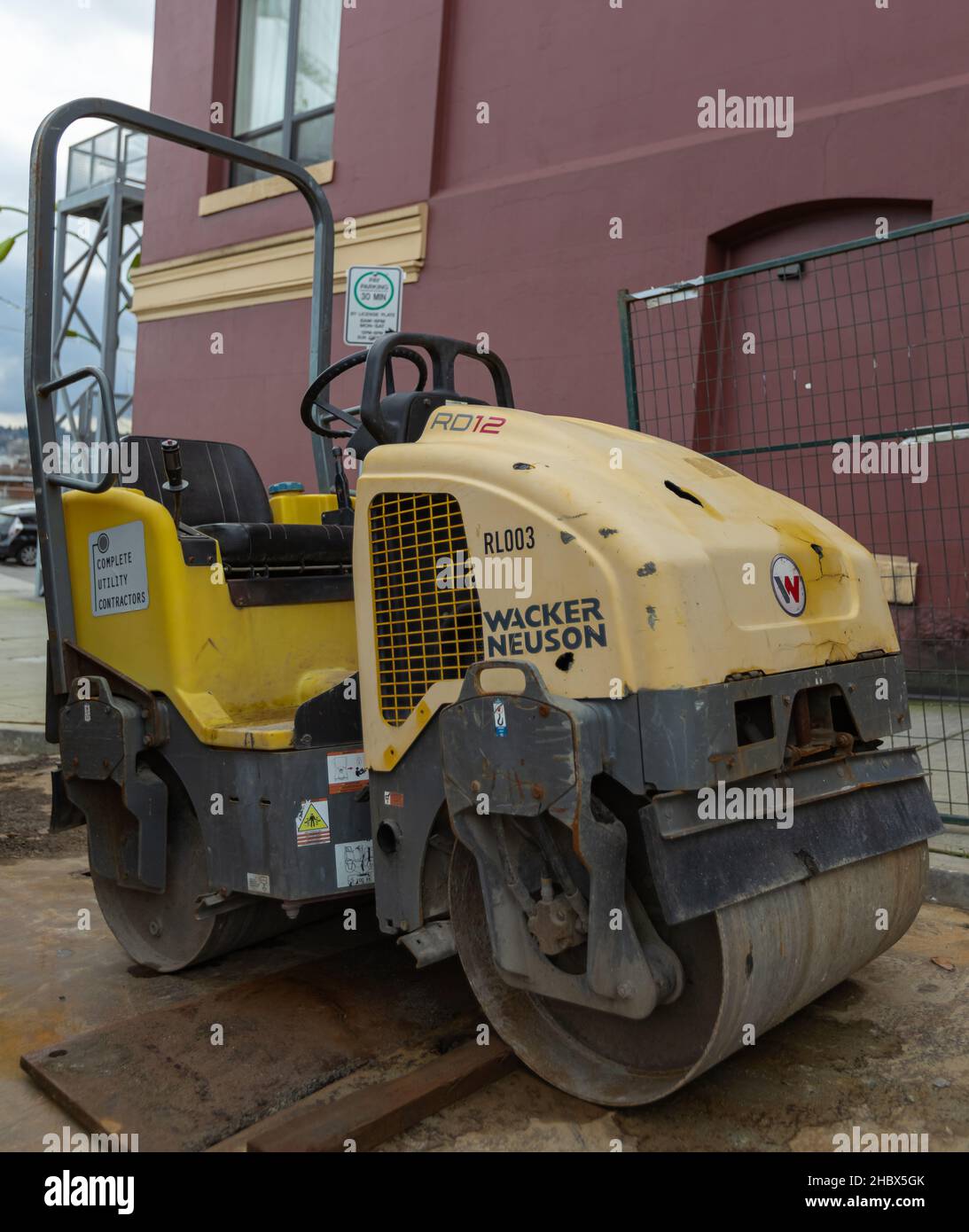 Double Drum asphalt roller at the road patching, leveling. Wacker ...