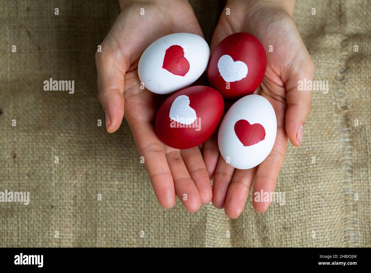 Holding easter egg hi-res stock photography and images - Alamy