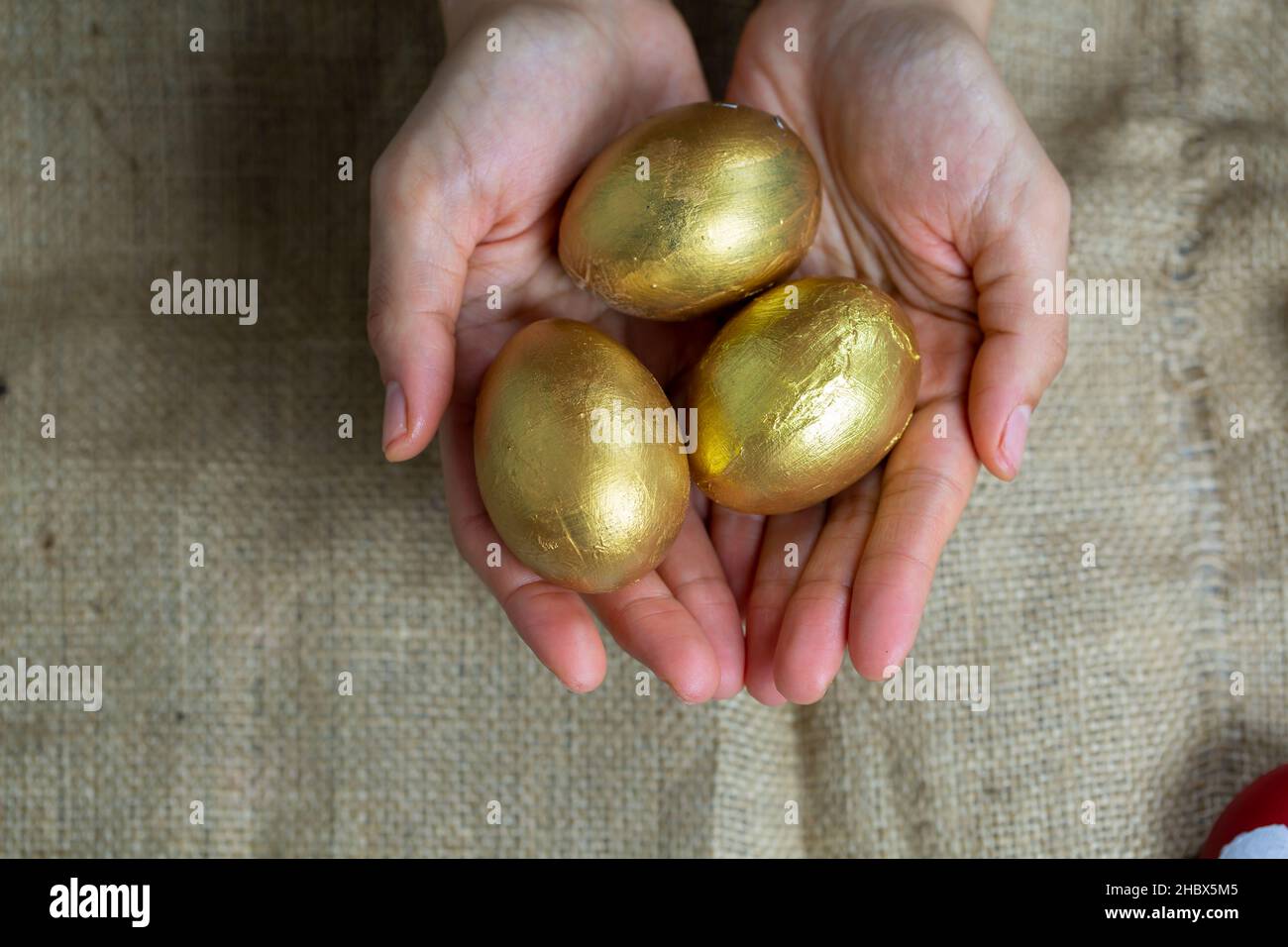 Happy easter hand holding hi-res stock photography and images - Alamy