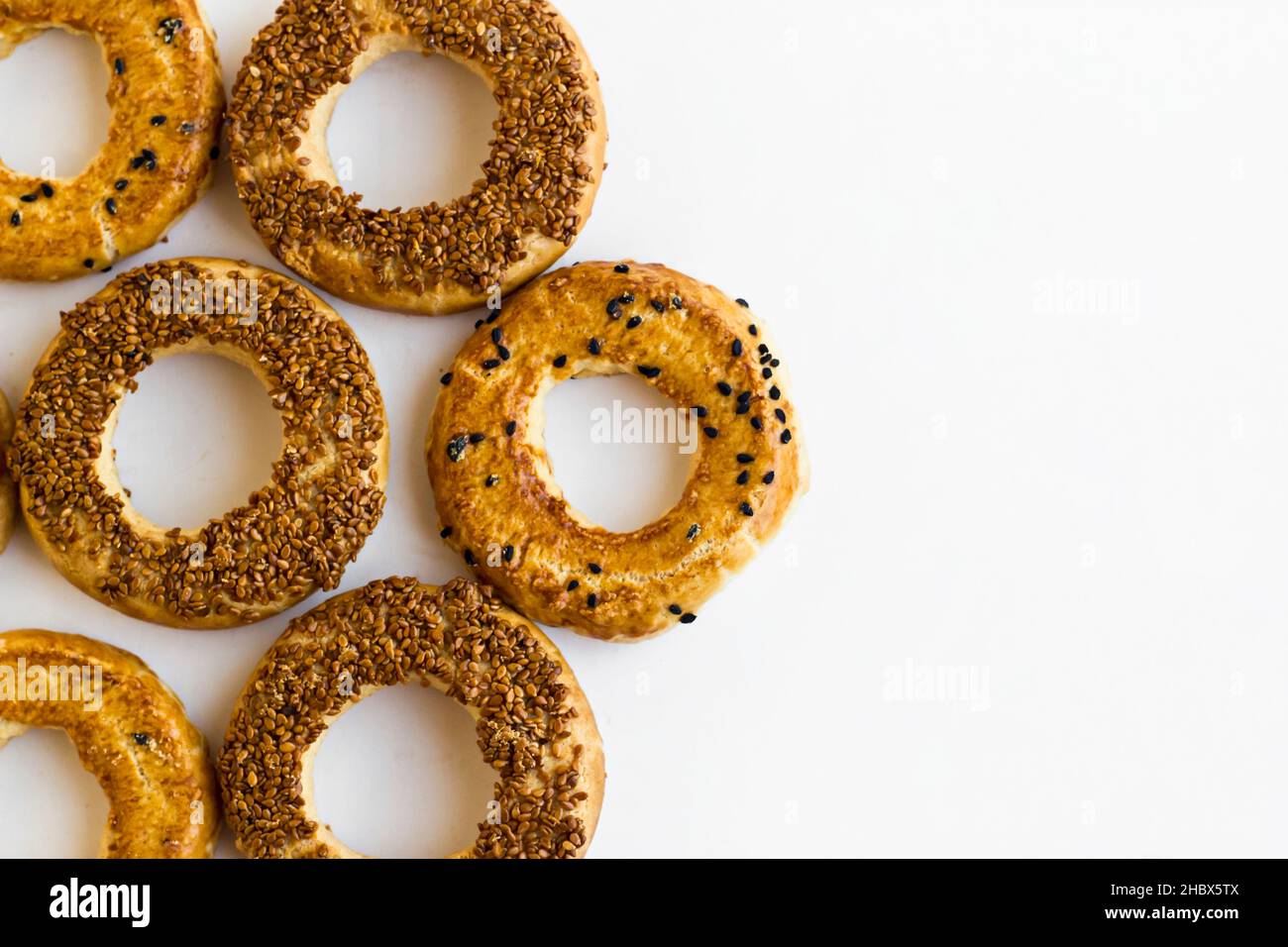 Traditional Turkish Sesame Rings Kandil Simidi on the white surface ...