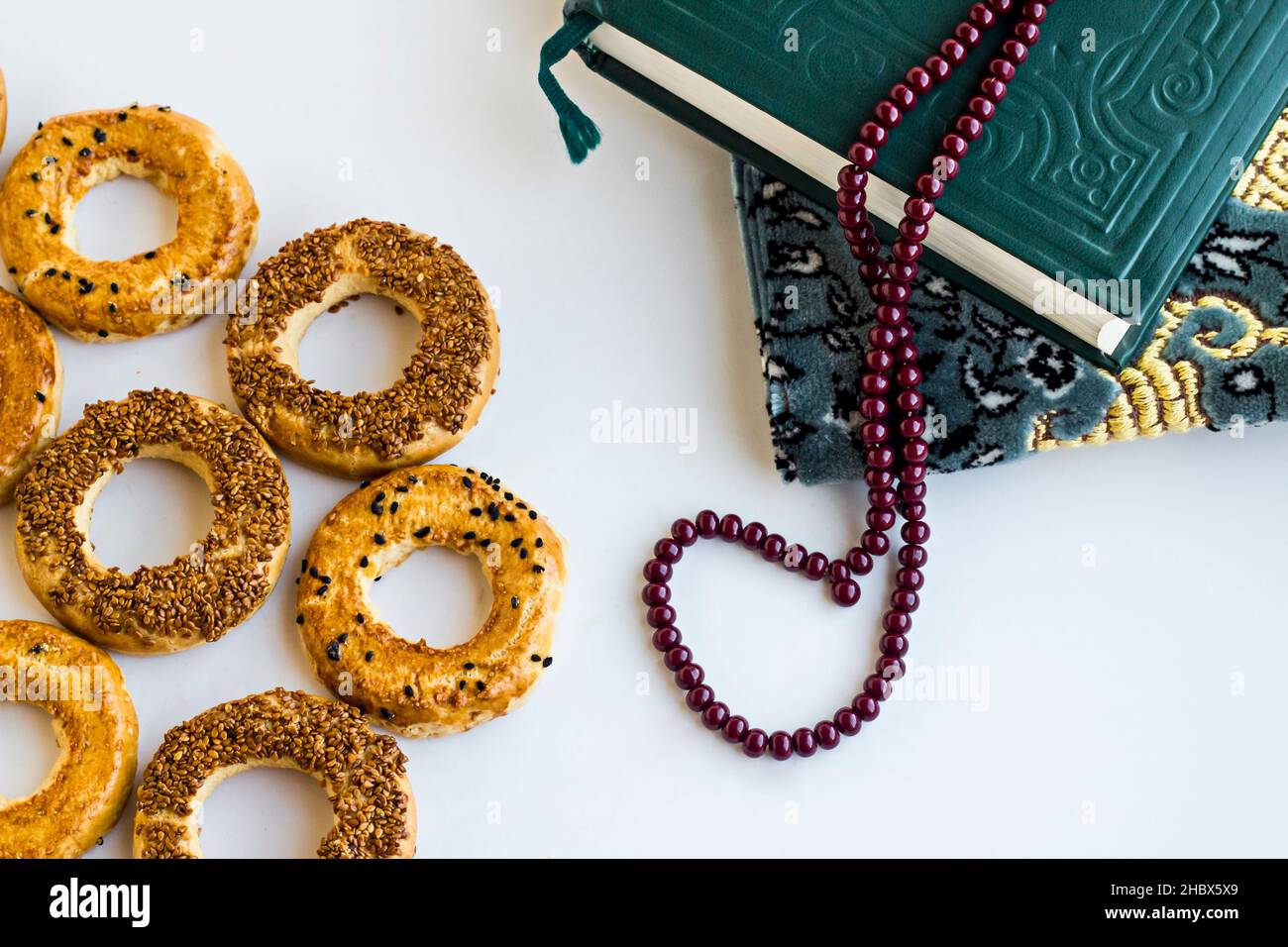 Traditional Turkish Sesame Rings Kandil Simidi on the white surface ...