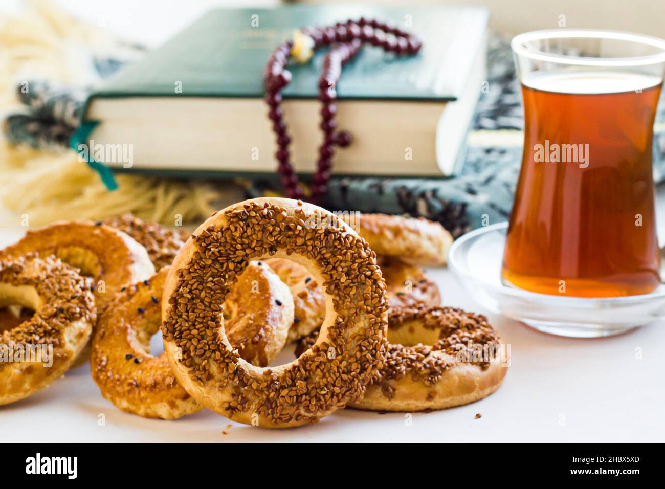 Traditional Turkish Sesame Rings Kandil Simidi on the white surface ...