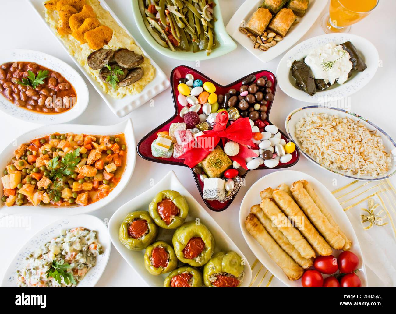 Setting dinner table for feast,bayram sofrasi with Traditional Turkish ...