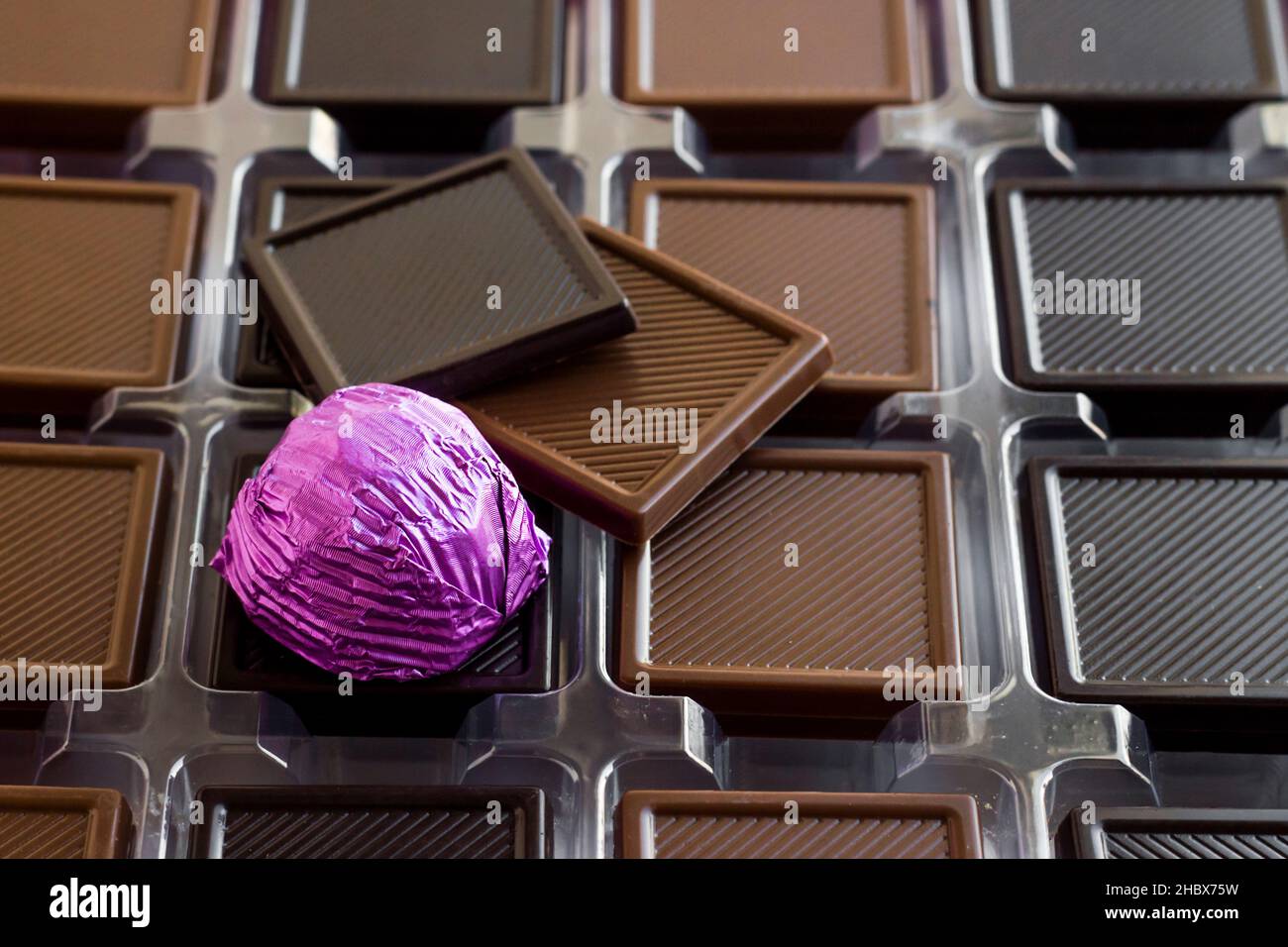 Purple color chocolate on the madlen chocolates.The Sugar Feast after ...