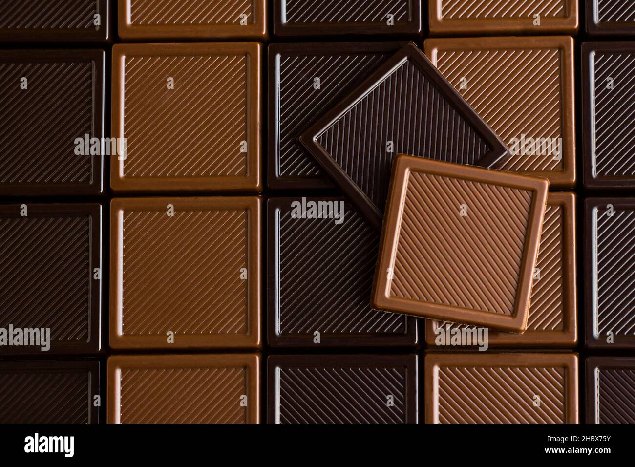 Milky and bitter square shape chocolate Madlen,designed as geometric ...