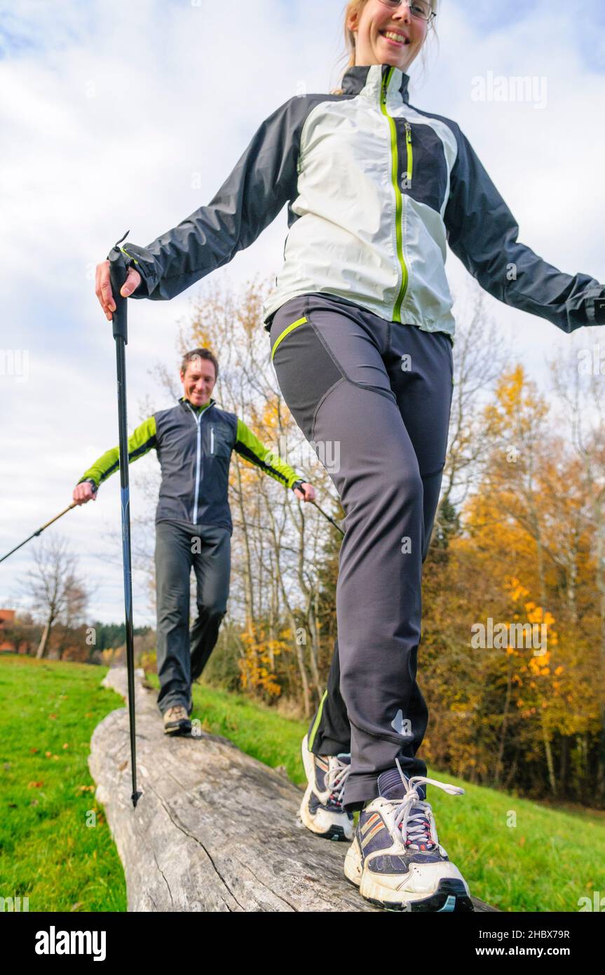 Nordic Walking exercises in falltime Stock Photo - Alamy