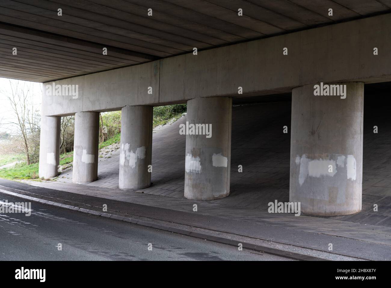 Concrete supports under motorway bridge Stock Photo - Alamy