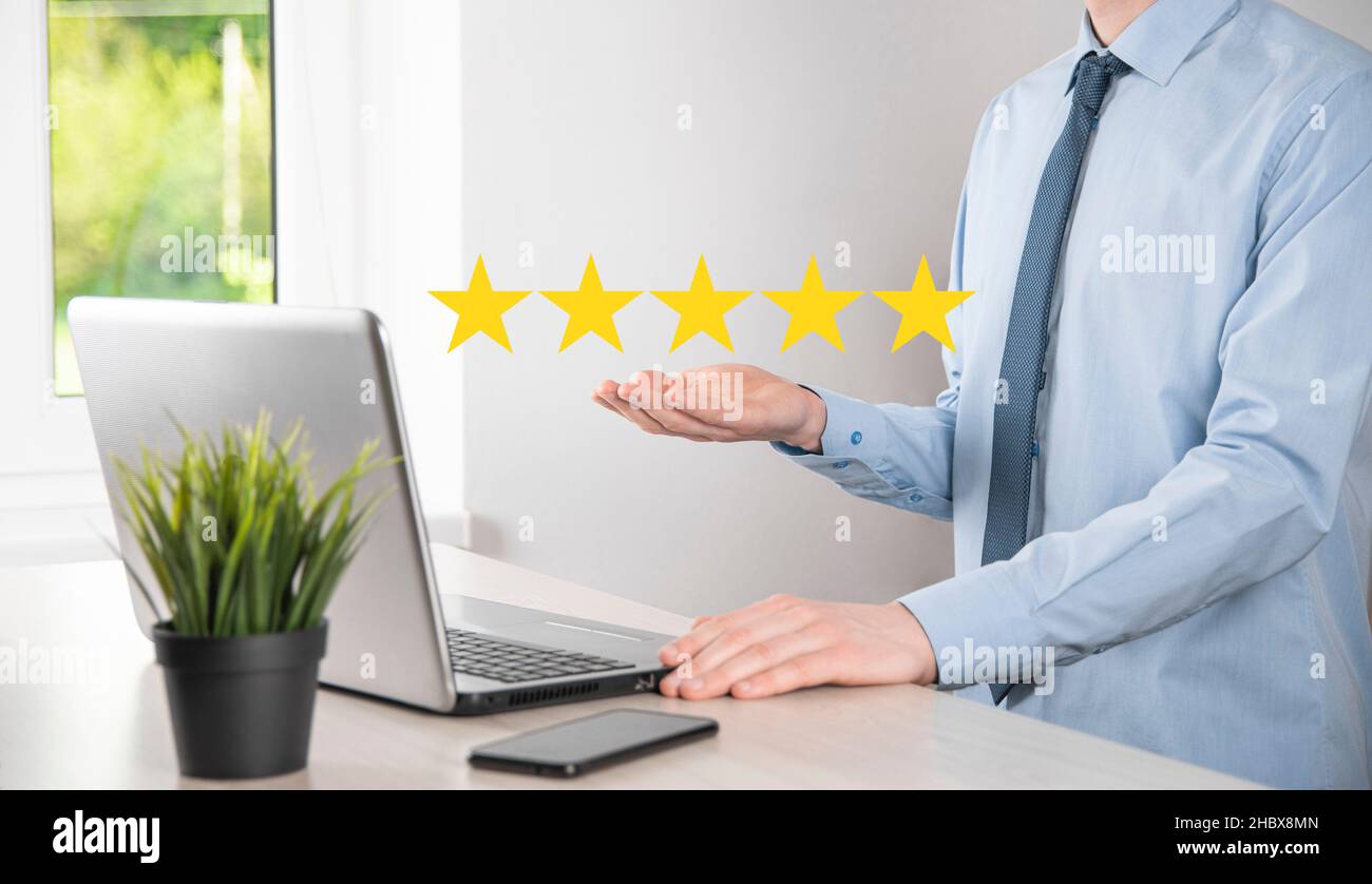 Man hand showing on five star excellent rating.pointing five star ...