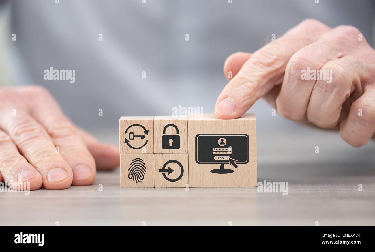 Wooden blocks with symbol of login concept Stock Photo - Alamy
