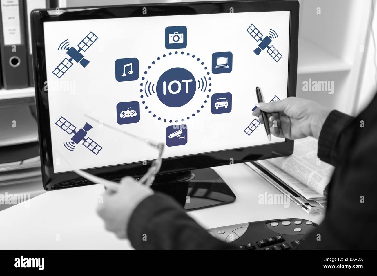 Businesswoman showing iot concept on a computer screen Stock Photo - Alamy