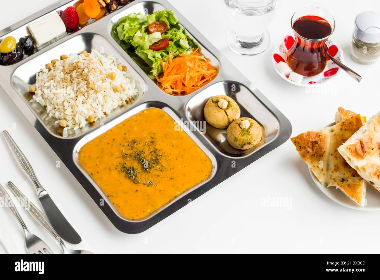 Traditional Turkish Ramadan iftar meal in the stainless steel,portion ...
