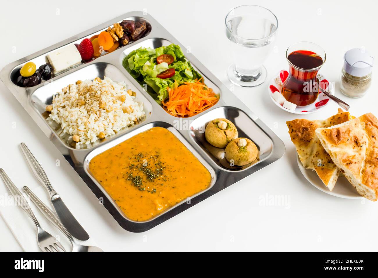 Traditional Turkish Ramadan iftar meal in the stainless steel,portion ...