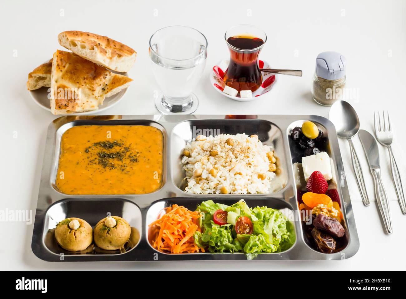Traditional Turkish Ramadan iftar meal in the stainless steel,portion ...
