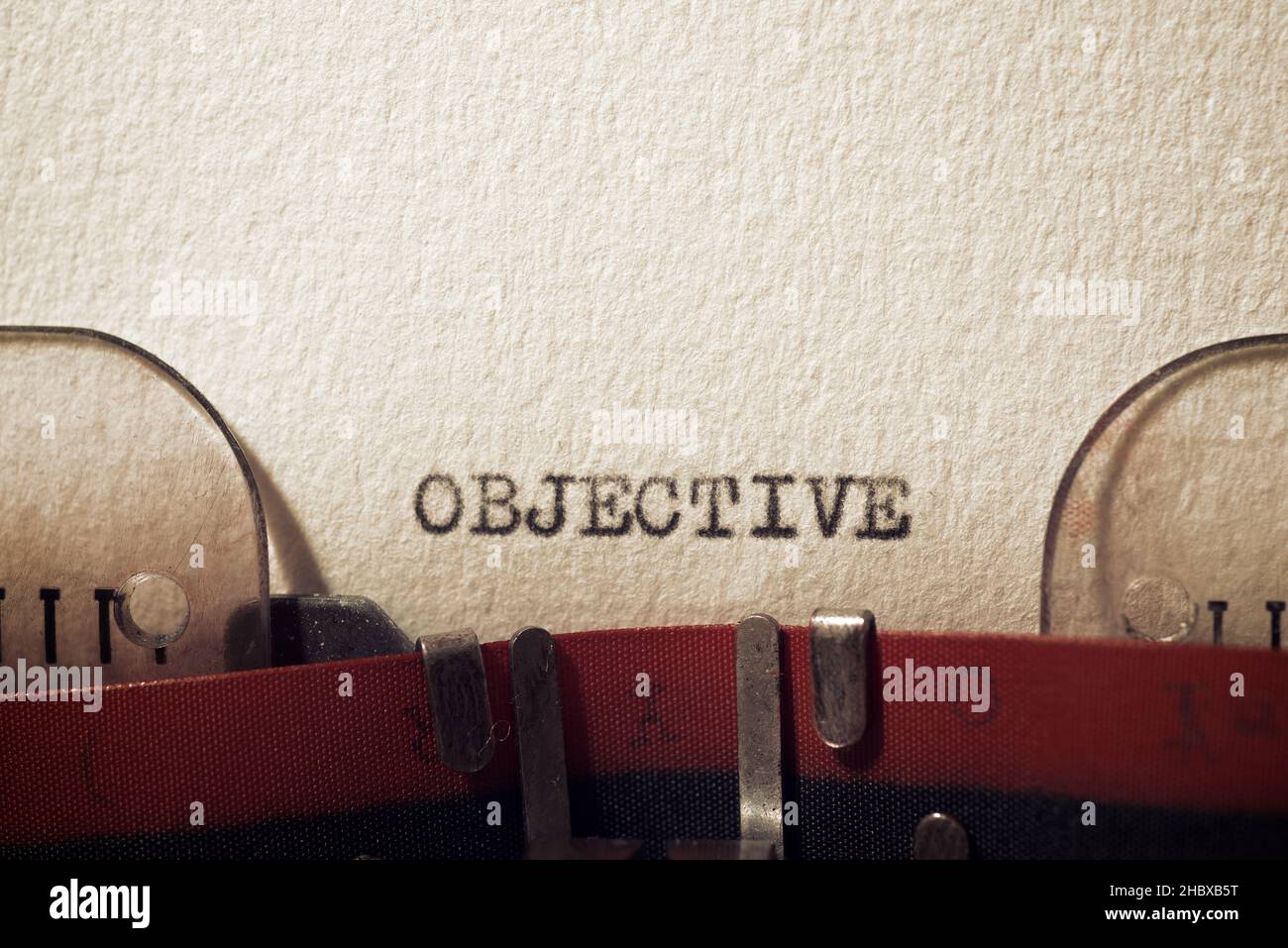 The word objective written with a typewriter Stock Photo - Alamy