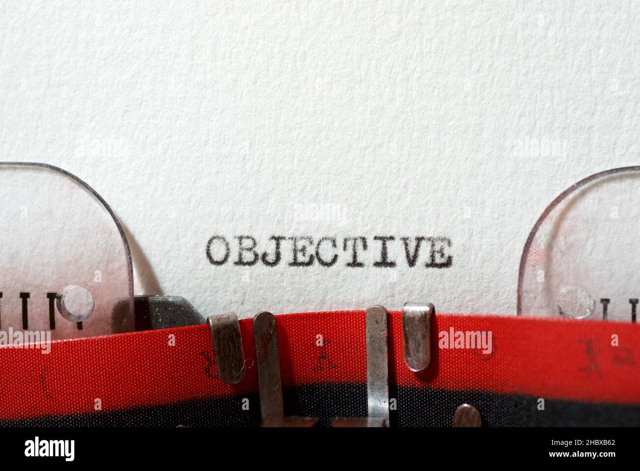 The word objective written with a typewriter Stock Photo - Alamy