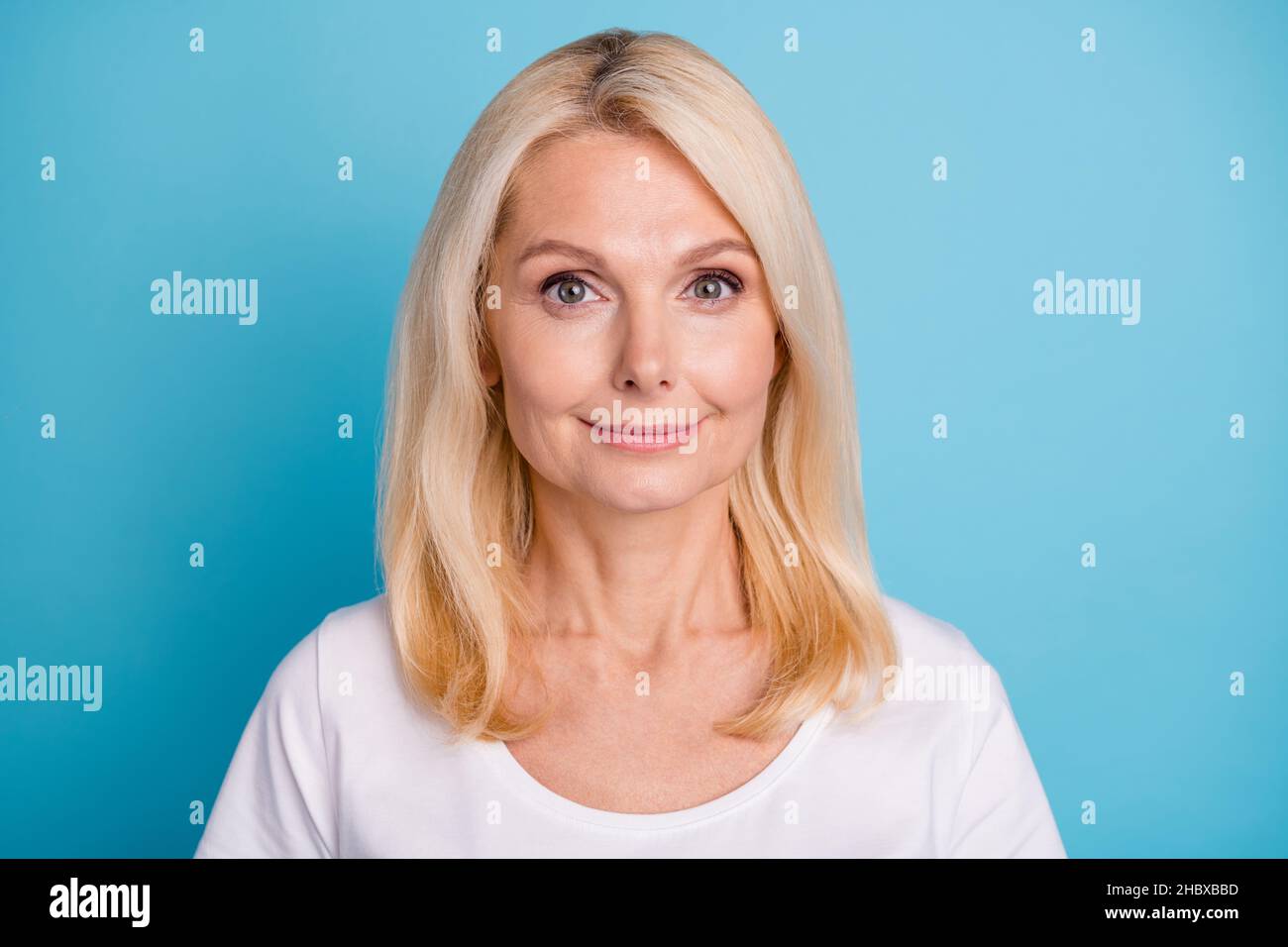Portrait of nice pretty old lady look good mood in camera wear white ...