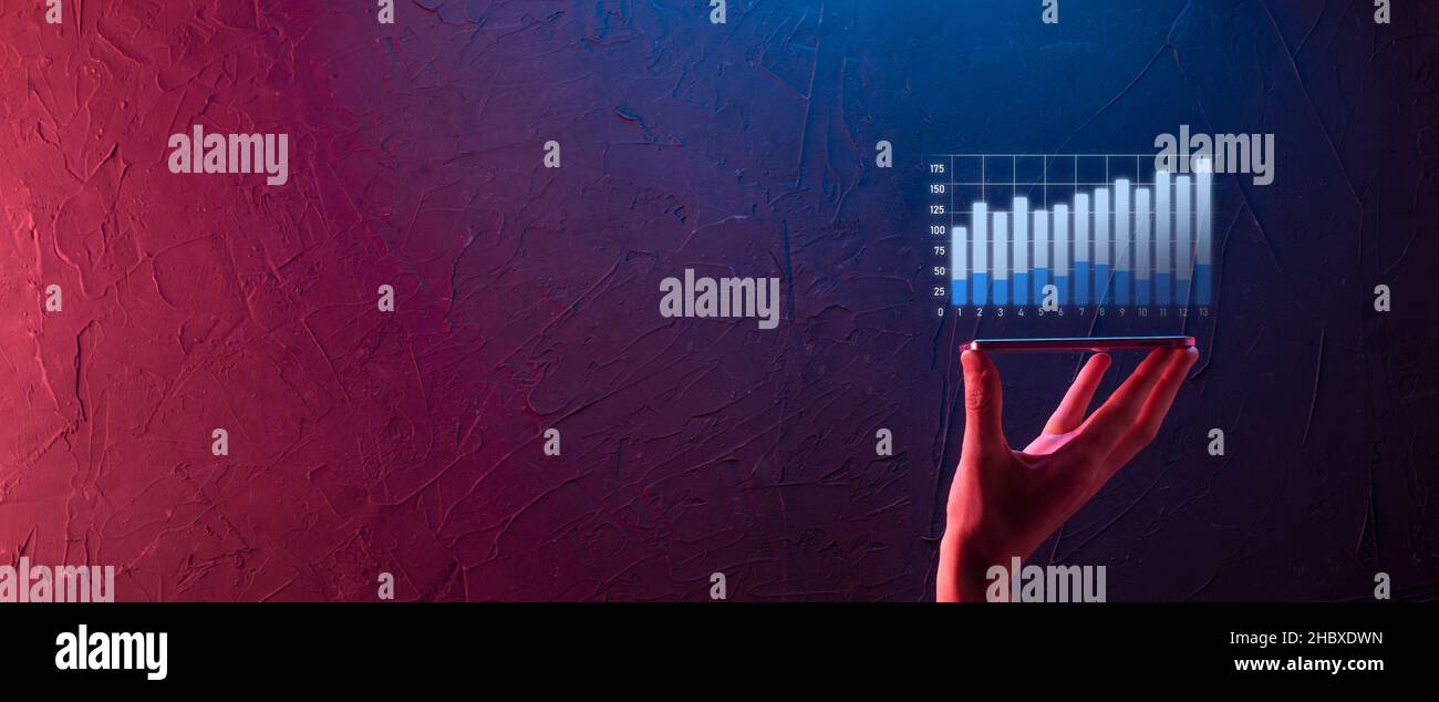 Businessman holding graph growth and increase of chart positive ...