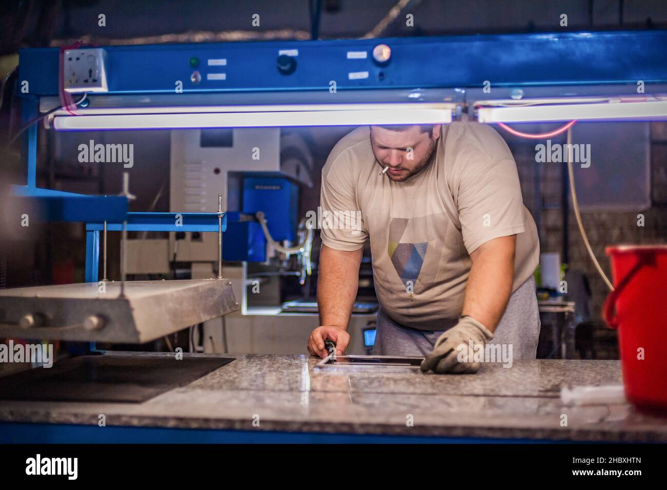 Professional worker technician work with soft PVC liquid rubber in mold ...