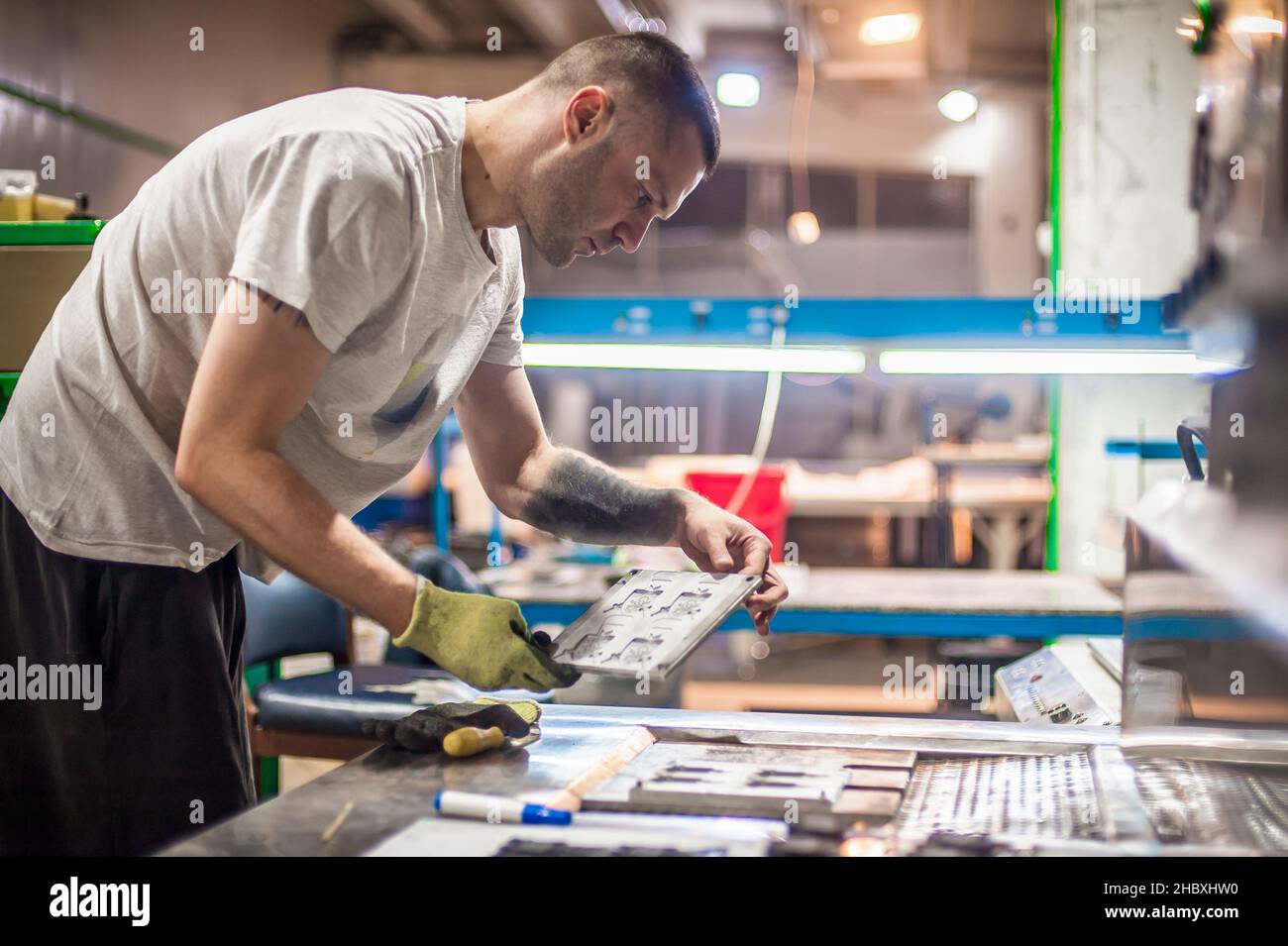 Professional worker technician work with soft PVC liquid rubber in mold ...