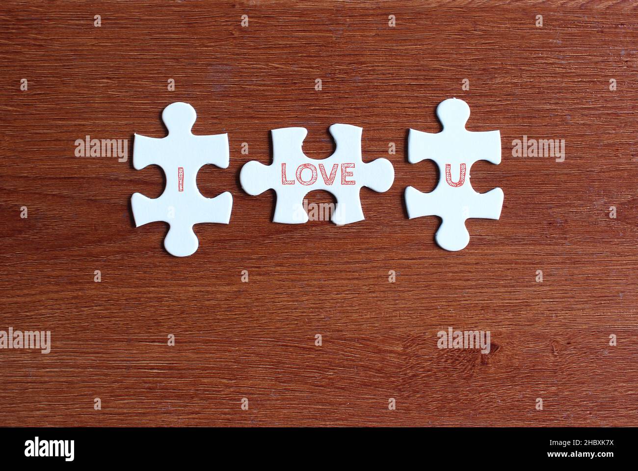Romantic and love concept. Top view image of jigsaw puzzle with text I ...