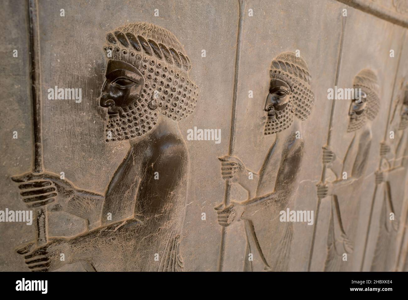 Ruins, statues and murals of ancient persian city of Persepolis in Iran ...