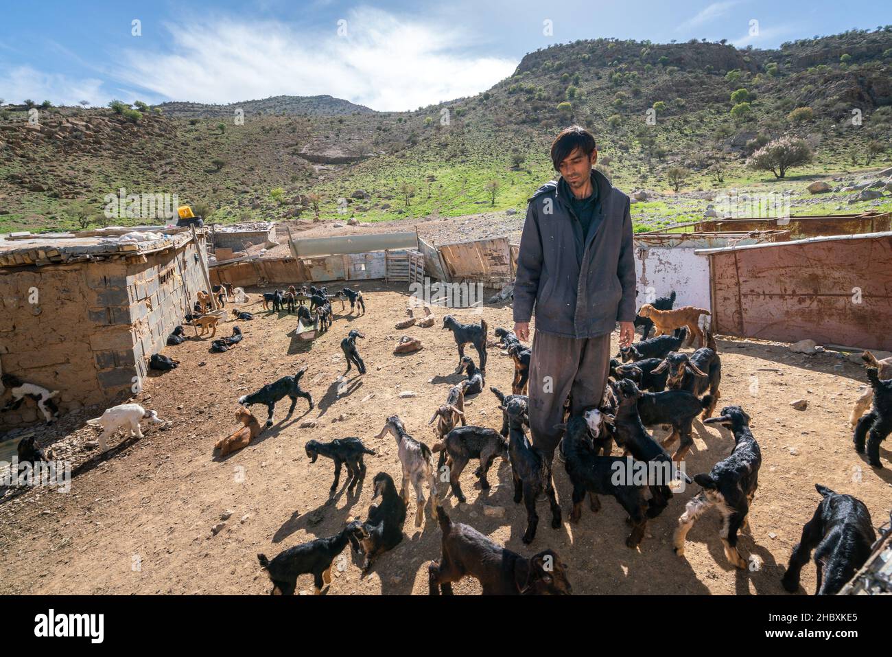 Shiraz, Iran - 04.10.2019: Iranian man standing in the midst of his ...