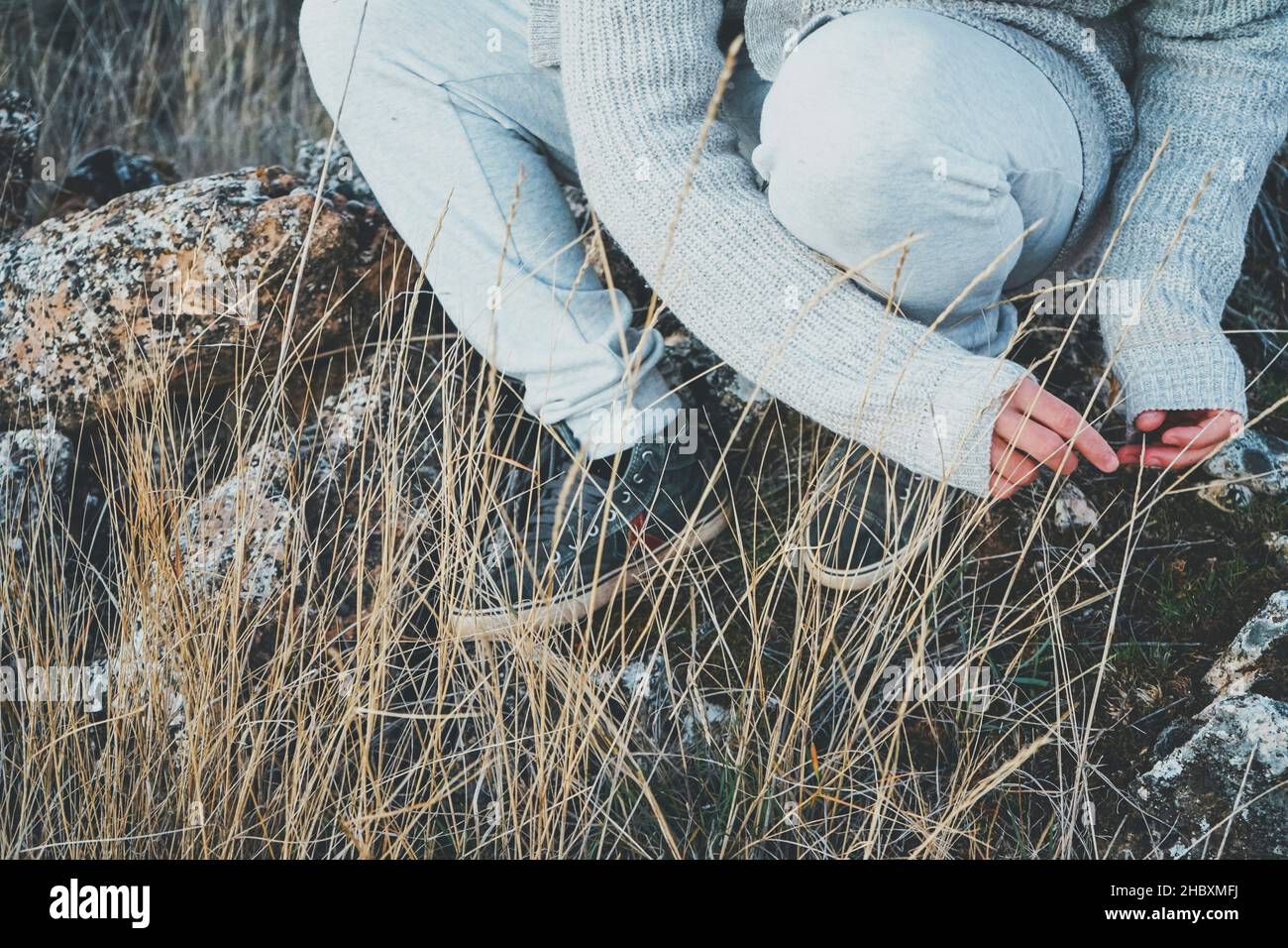 Delicate image of a young man touching nature Stock Photo - Alamy