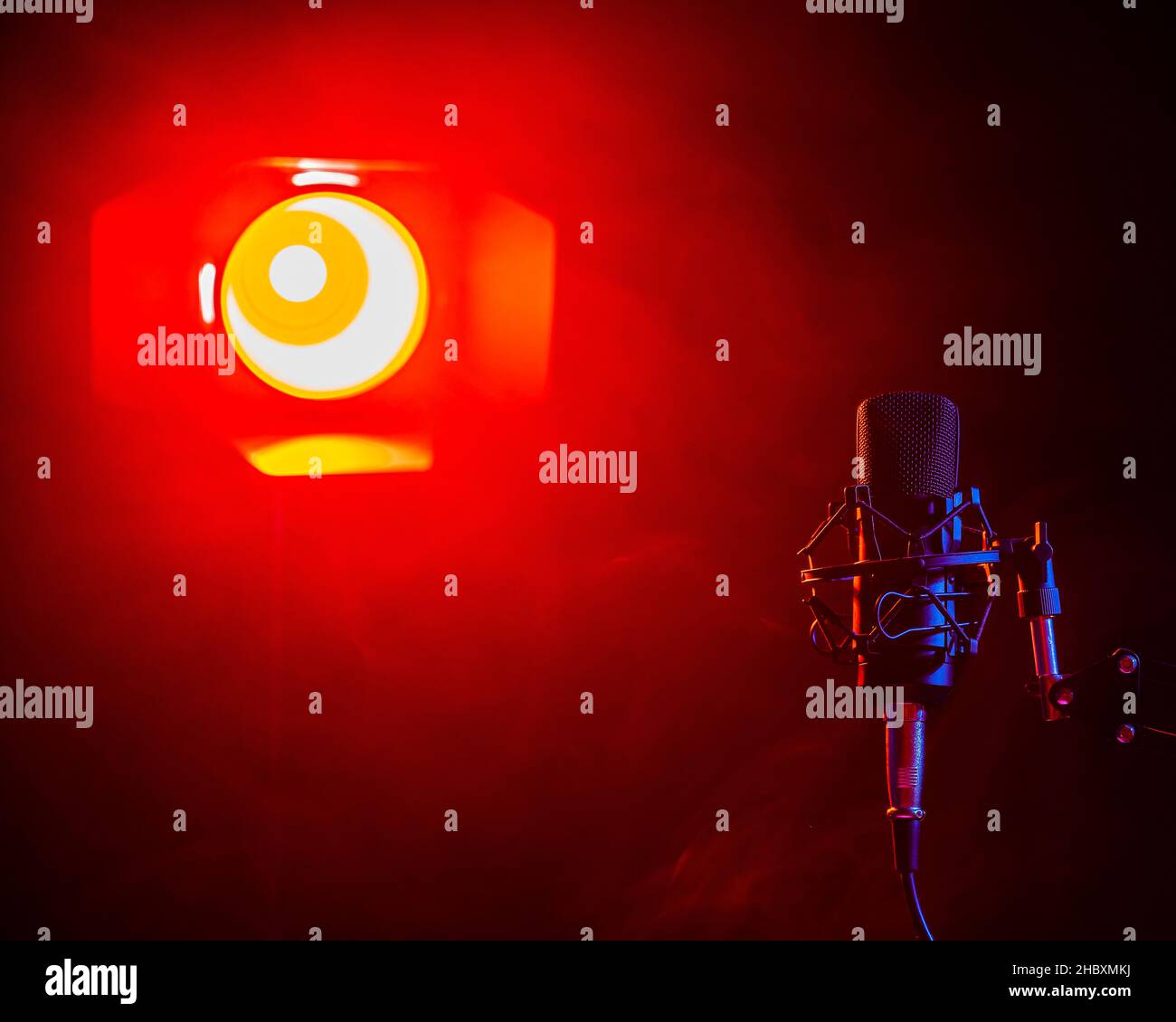 Professional microphone in red smoke on a black background Stock Photo ...