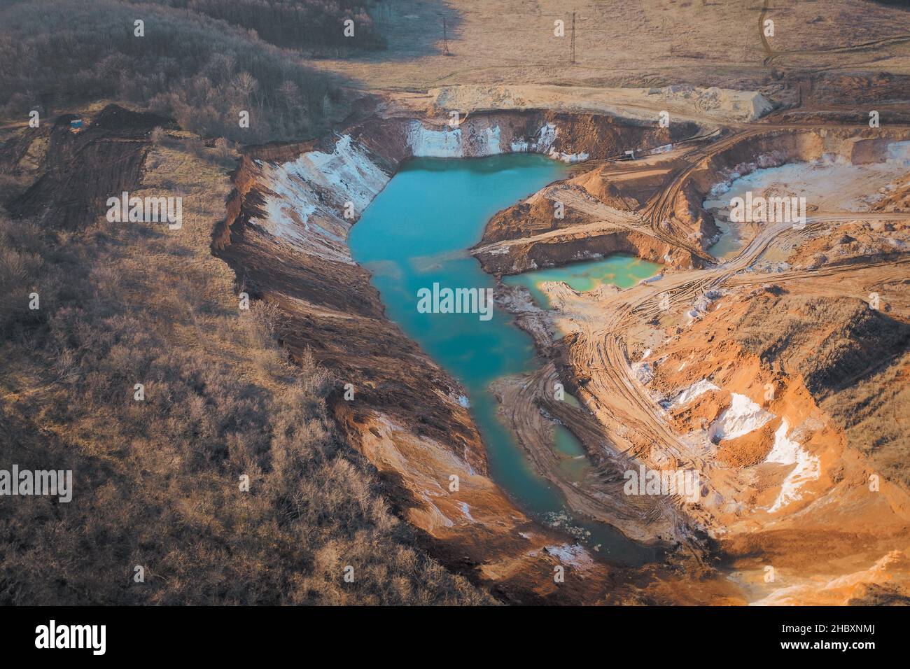 Big industrial Mine quarry with lake for extraction of sand and red ...
