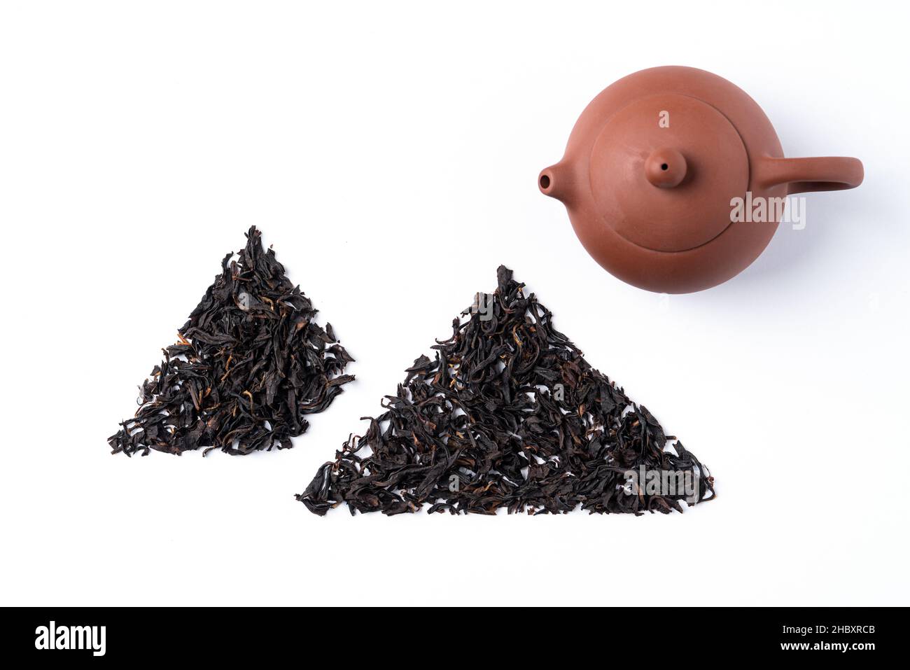 Top view of fresh black tea with kettle teapot and leaves in Taiwan ...