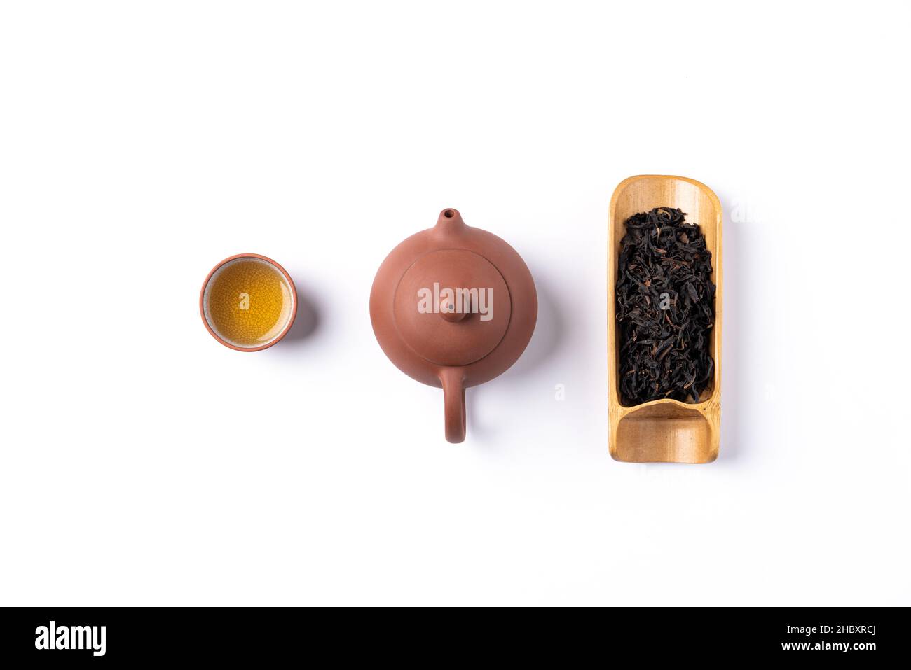 Top view of fresh black tea with kettle teapot and leaves in Taiwan ...